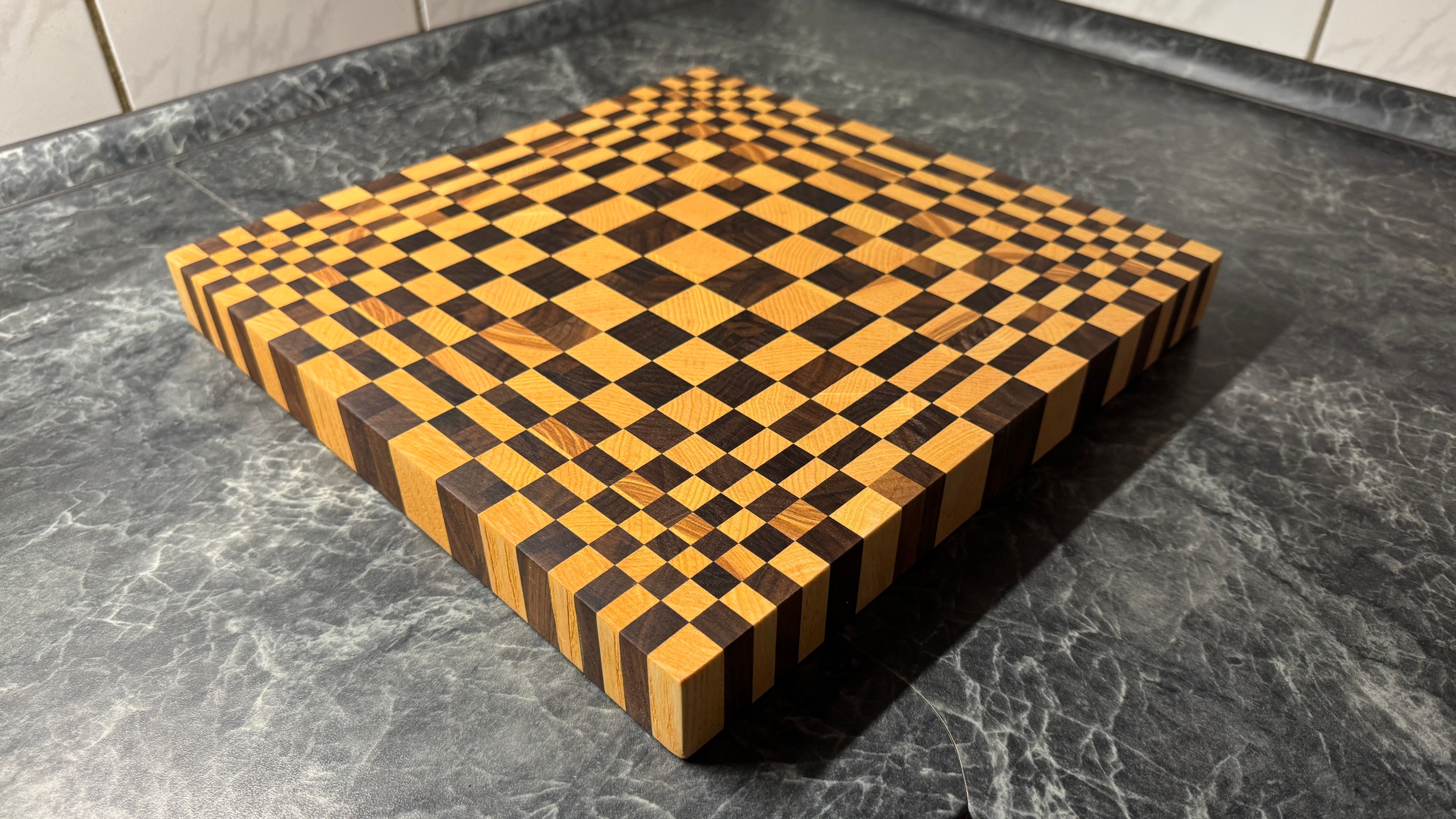 End grain cutting board with 3D optical illusion